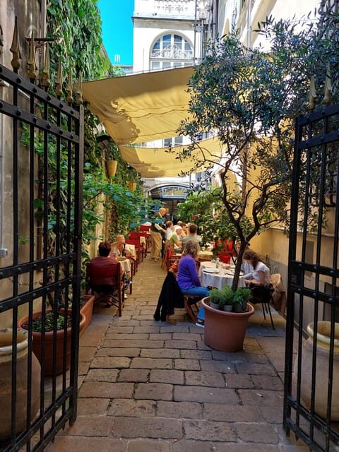 Walking Tour in Genoa with Tastings and Stories - Key Points