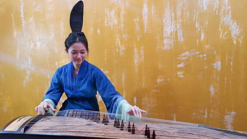 Wear Hanfu and play guzheng - Key Points