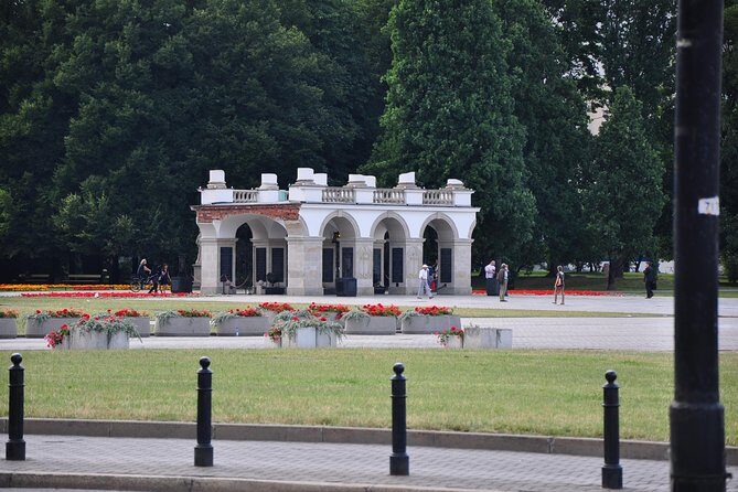 World War II Warsaw Private Tour with Military Cemetery - Visiting the Powazki Military Cemetery