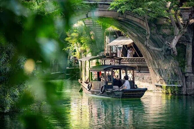 Wuzhen and Xitang Water Town Day Tour with Guide from Shanghai - Key Points