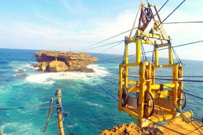 Yogyakarta a day tour Jomblang Cave & Timang Beach - Timang Beach: A Cliffside Adventure