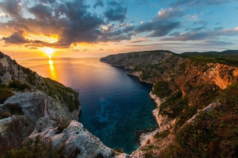 Zakynthos Sunset Tour to Kampi with Greek Night! - Key Points