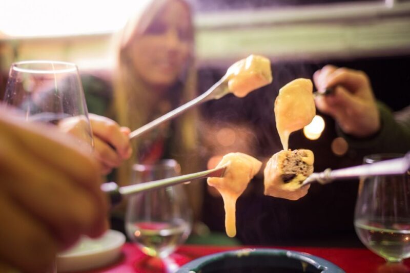 Zurich: Swiss Cheese Fondue and Wine e-Tuk-Tuk Tour - Key Points